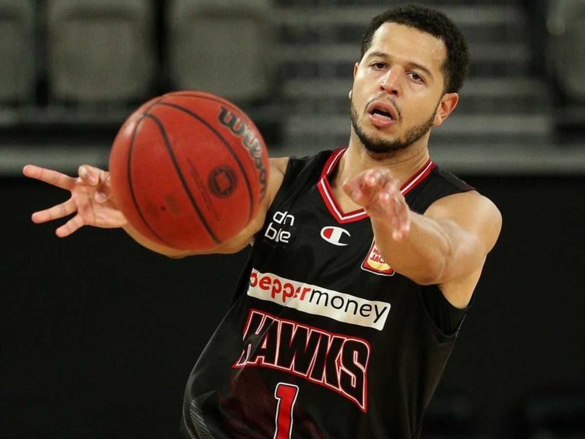 Harvey stars as Hawks outlast Breakers